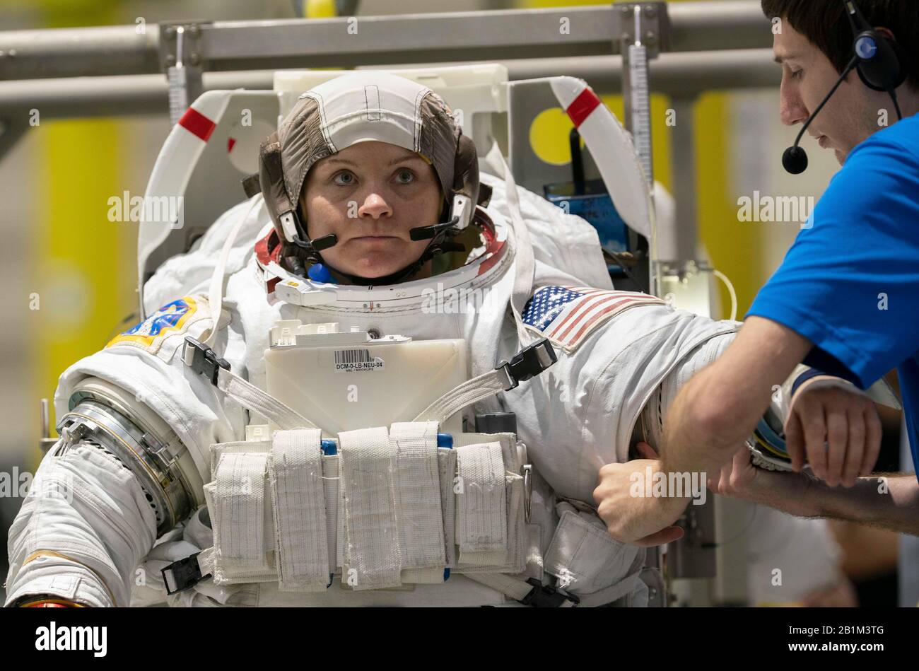 Veteran astronaut Anne C. McClain suits up in NASA's Neutral Buoyancy ...