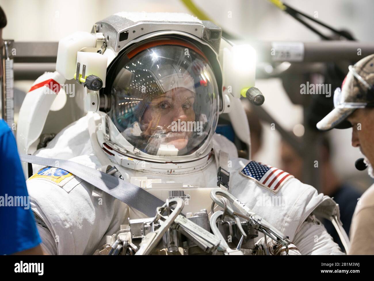 Veteran astronaut Anne C. McClain suits up in NASA's Neutral Buoyancy ...