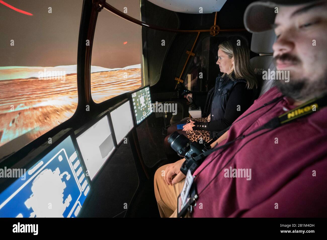 Journalists drive a future two-person Mars Rover simulator in NASA's ...
