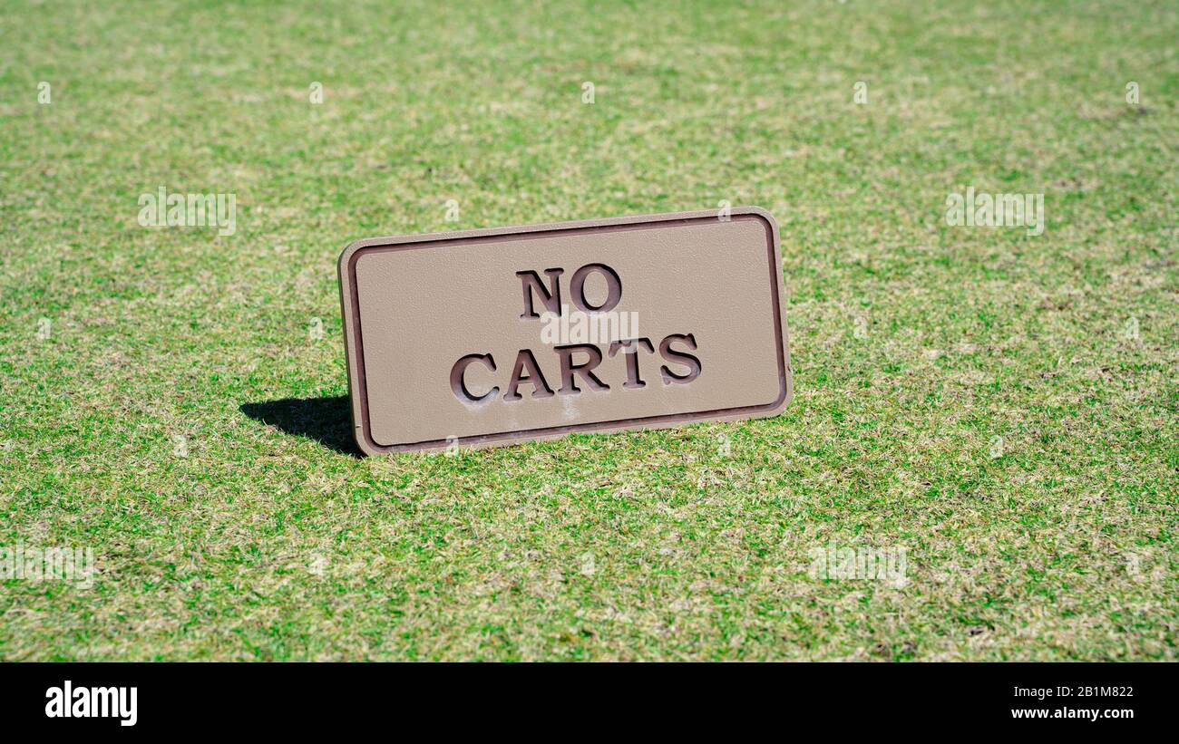 Background image of wood no carts sign board on a golf course Stock ...
