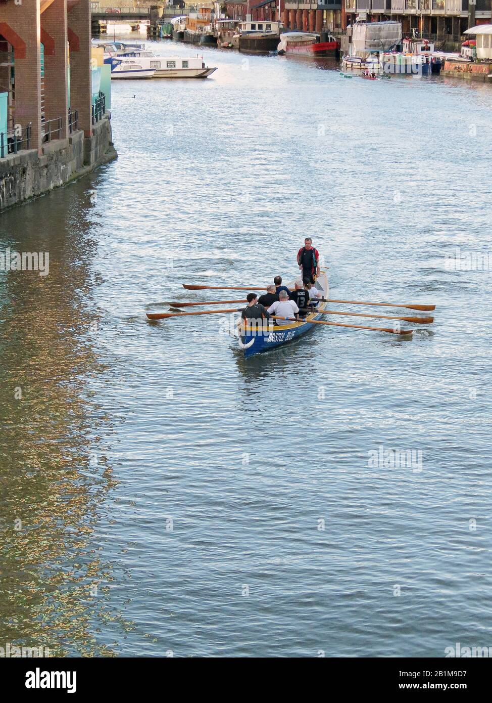 rowers row through Bristol harbour Stock Photo - Alamy