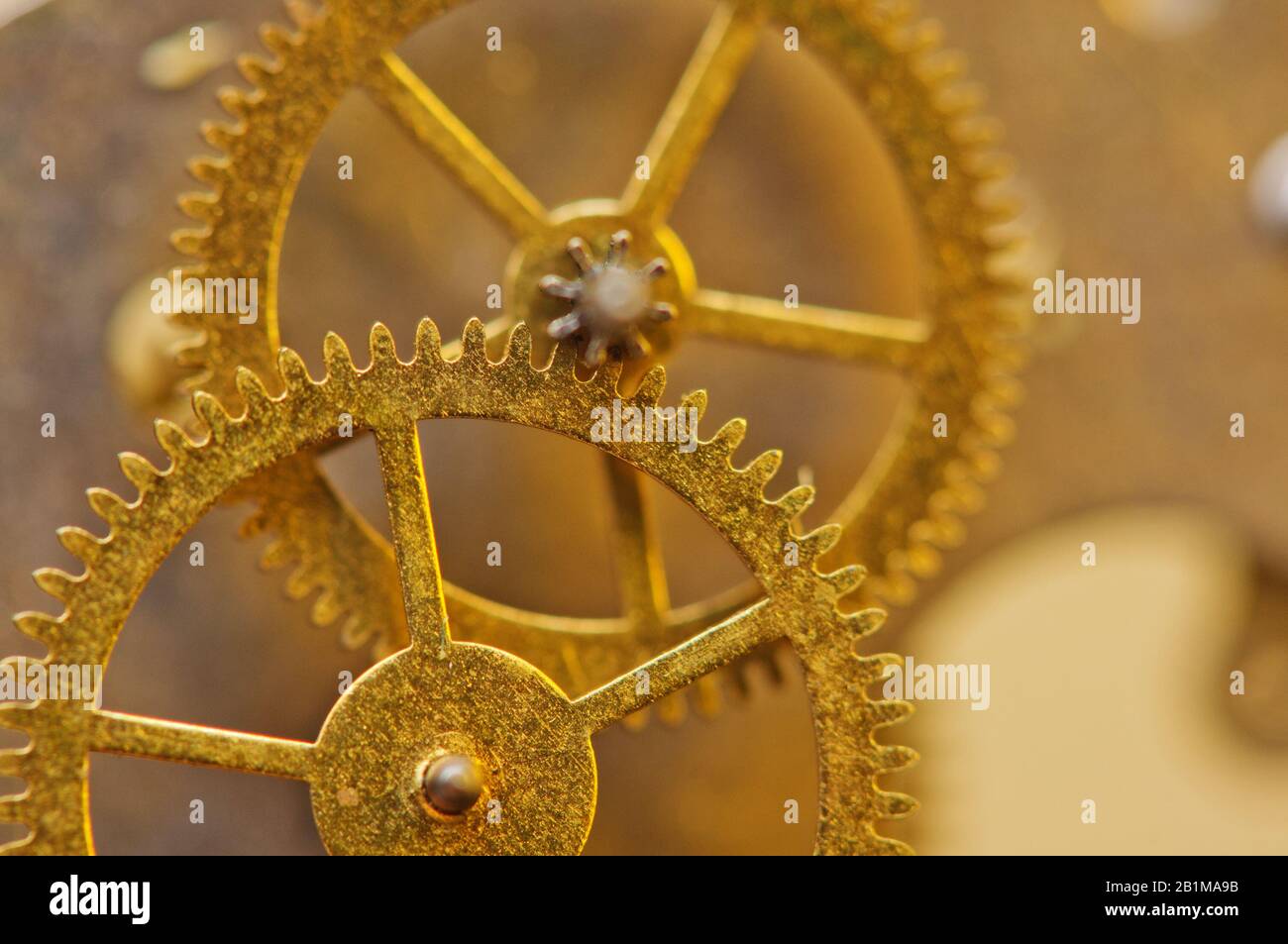 Cog wheels. Yellow gears, clockwork. The concept of time, teamwork ...