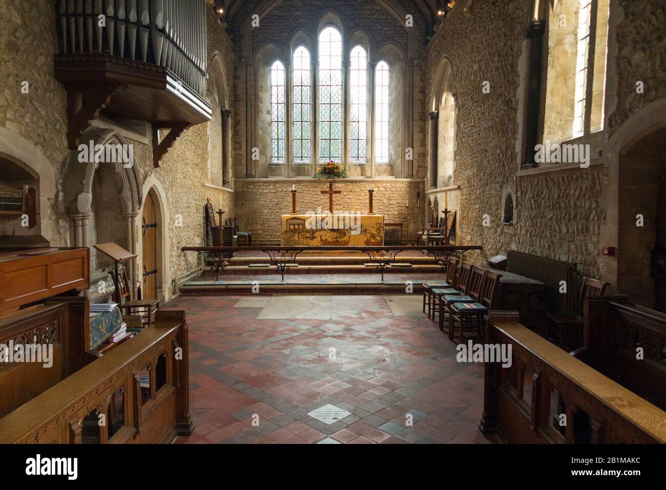 Inside Bosham Holy Trinity church interior showing Chancel with altar ...