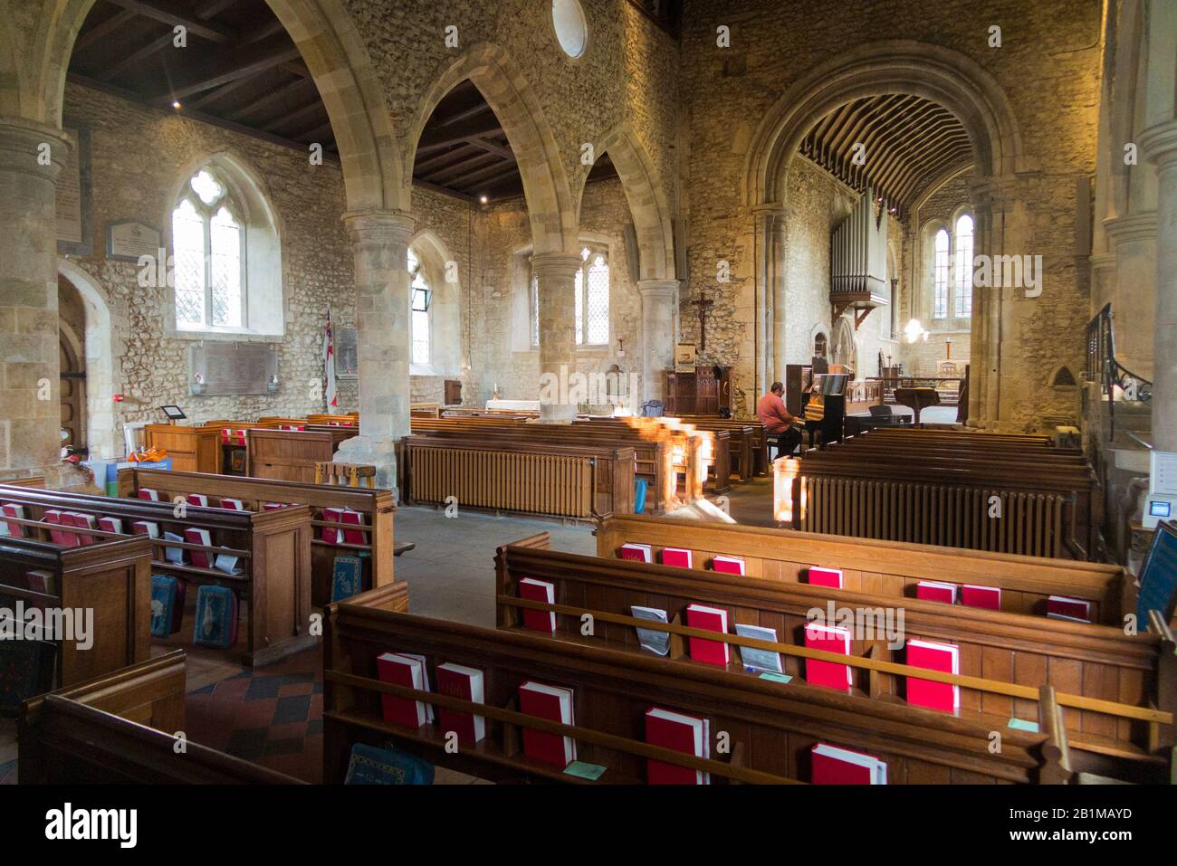 Inside Bosham Holy Trinity church interior showing the nave, chancel ...