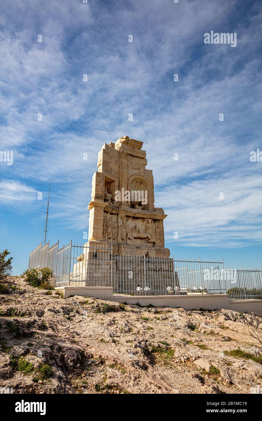 Philopappos Monument low angle view, blue sky background. Filopappos ...