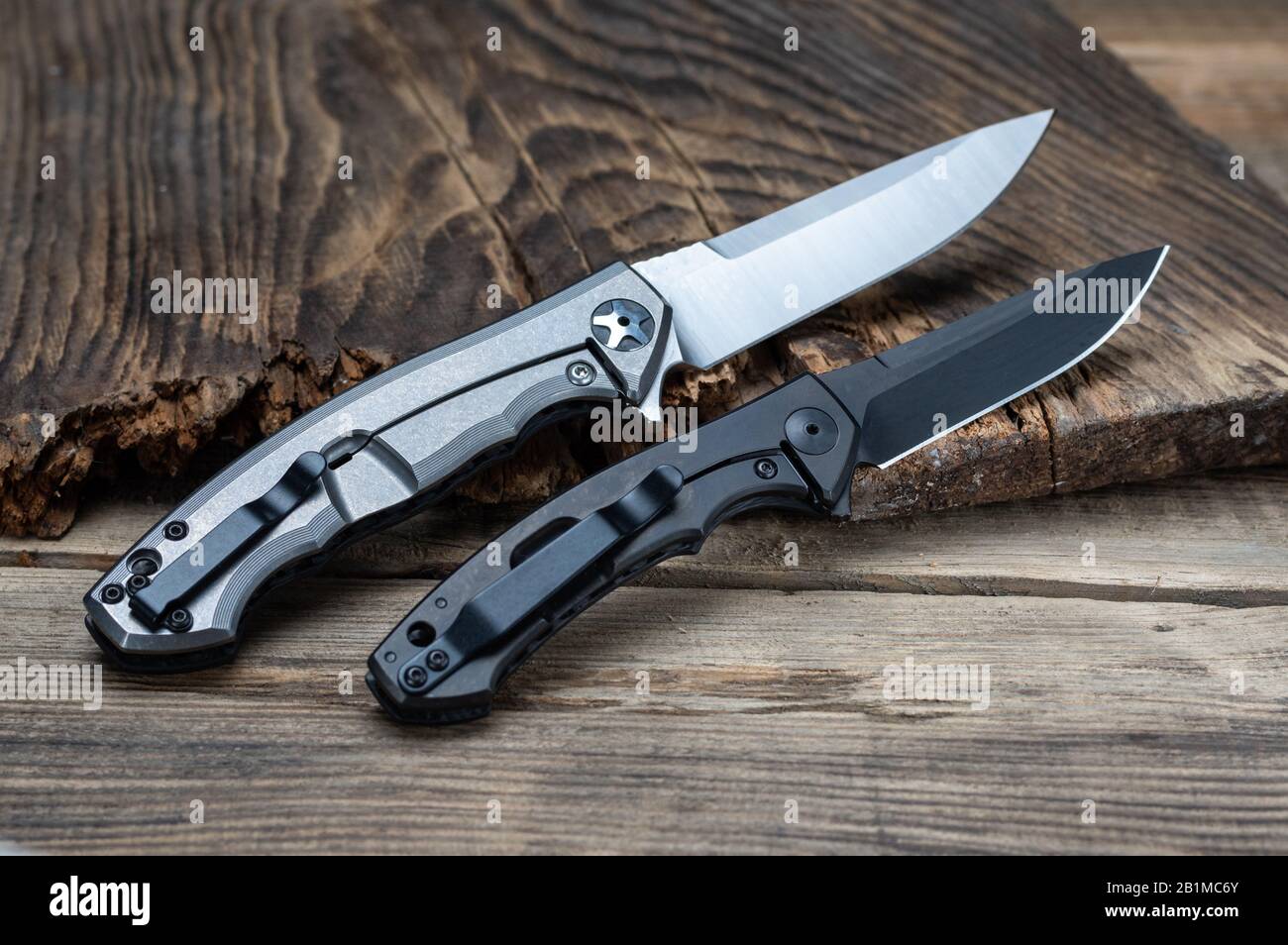 The reverse side of the knives. American knives. Black and white knife ...