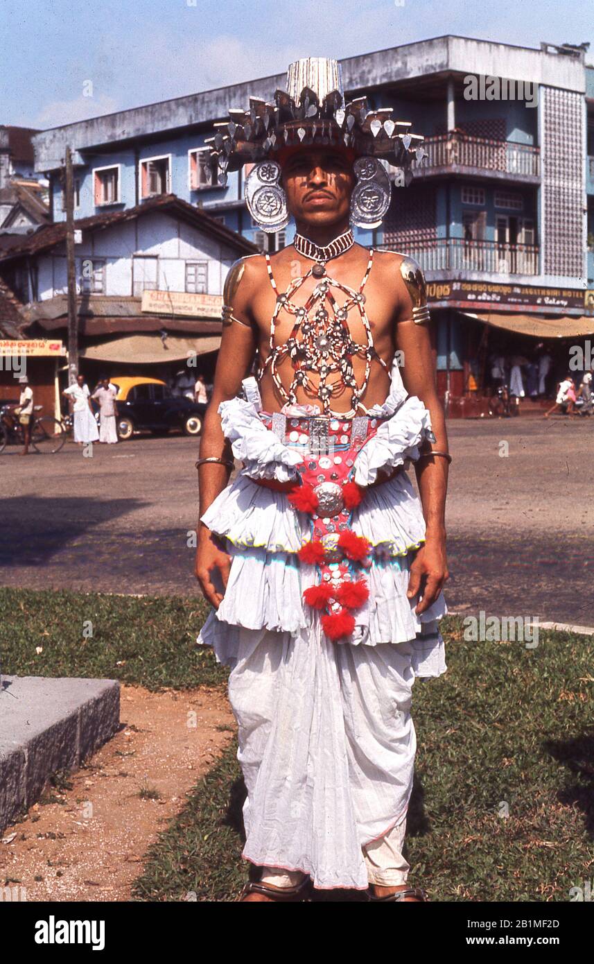 1960s, historical, native man standing outside in traditional dress or ...