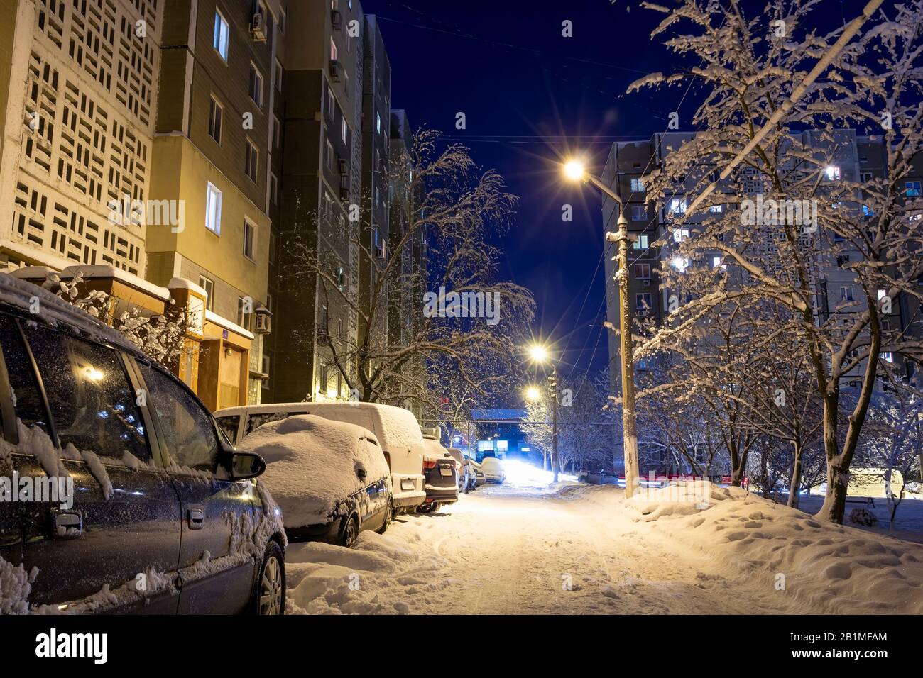 Snowfall car park in late hi-res stock photography and images - Alamy