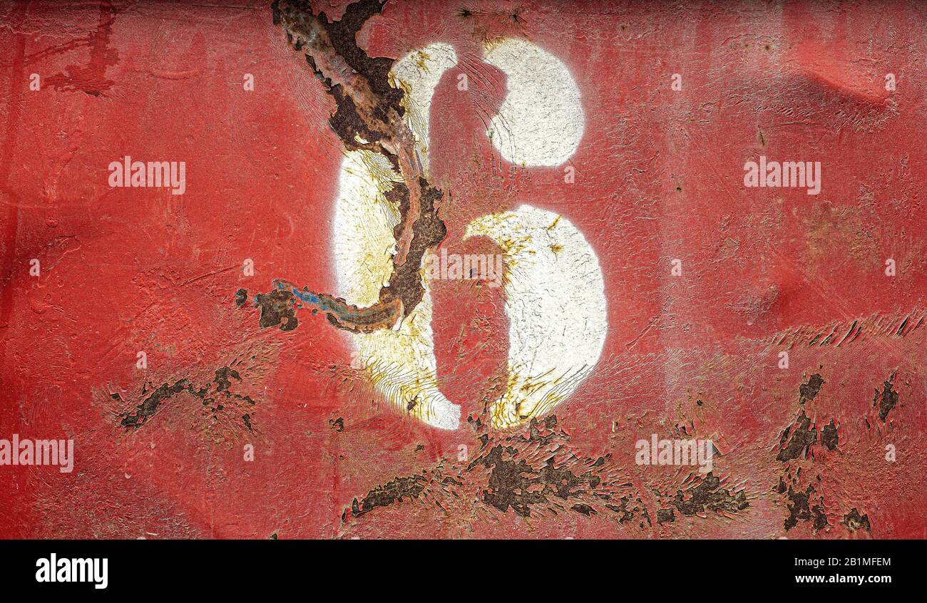 Numbers on an old rusty metal background. Texture of old paint and rust ...