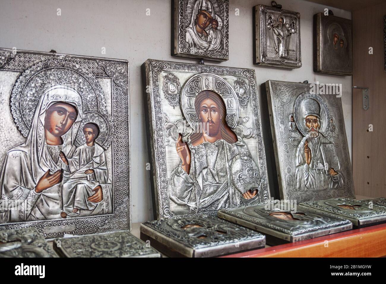 Orthodox icons in silver frames at the monastery shop, Meteora, Greece ...