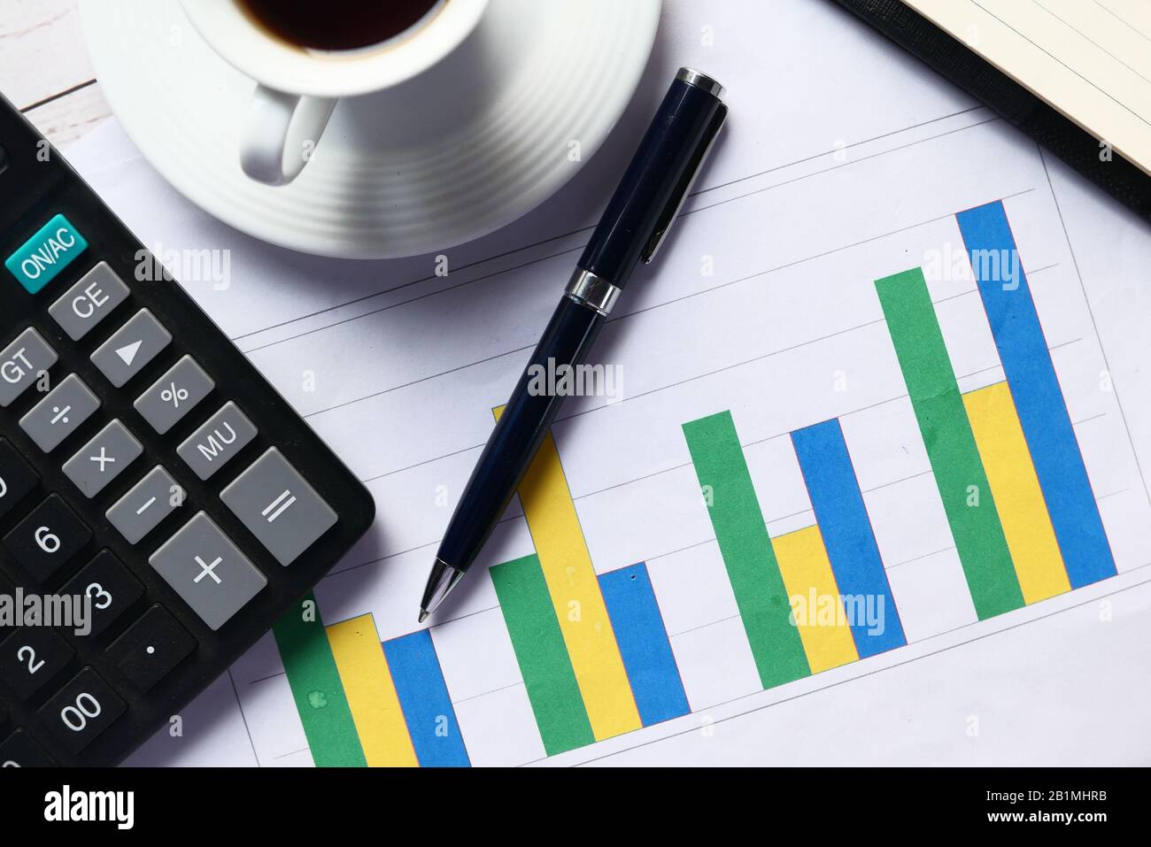 close up of financial chart and calculator on table, using self created ...