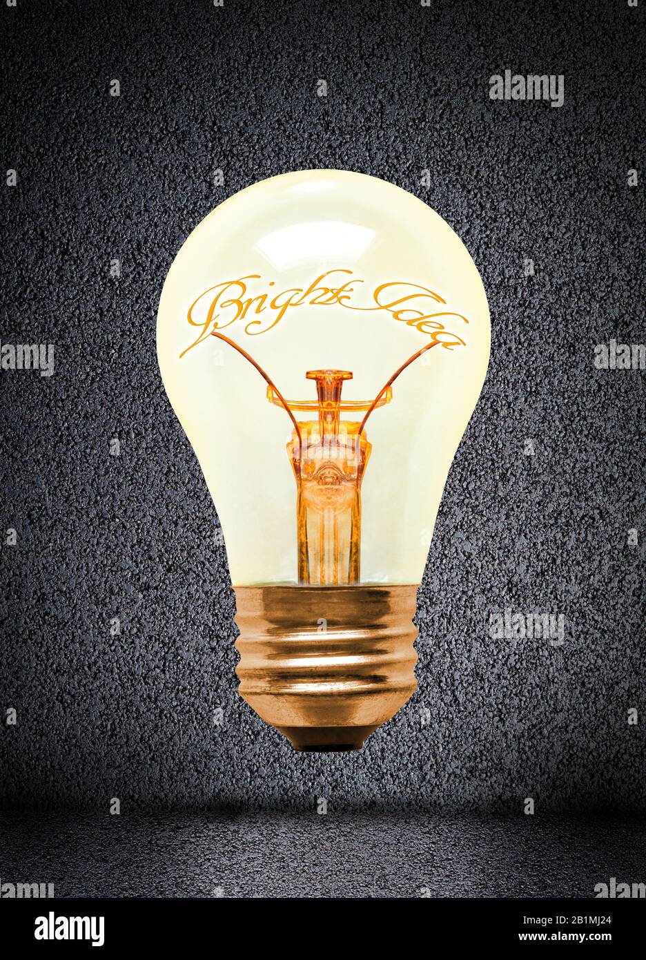 Illuminated light bulb with glowing bright idea text and copy space ...
