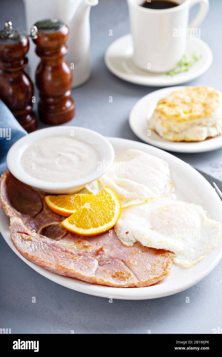 Ham and eggs breakfast with biscuits Stock Photo - Alamy