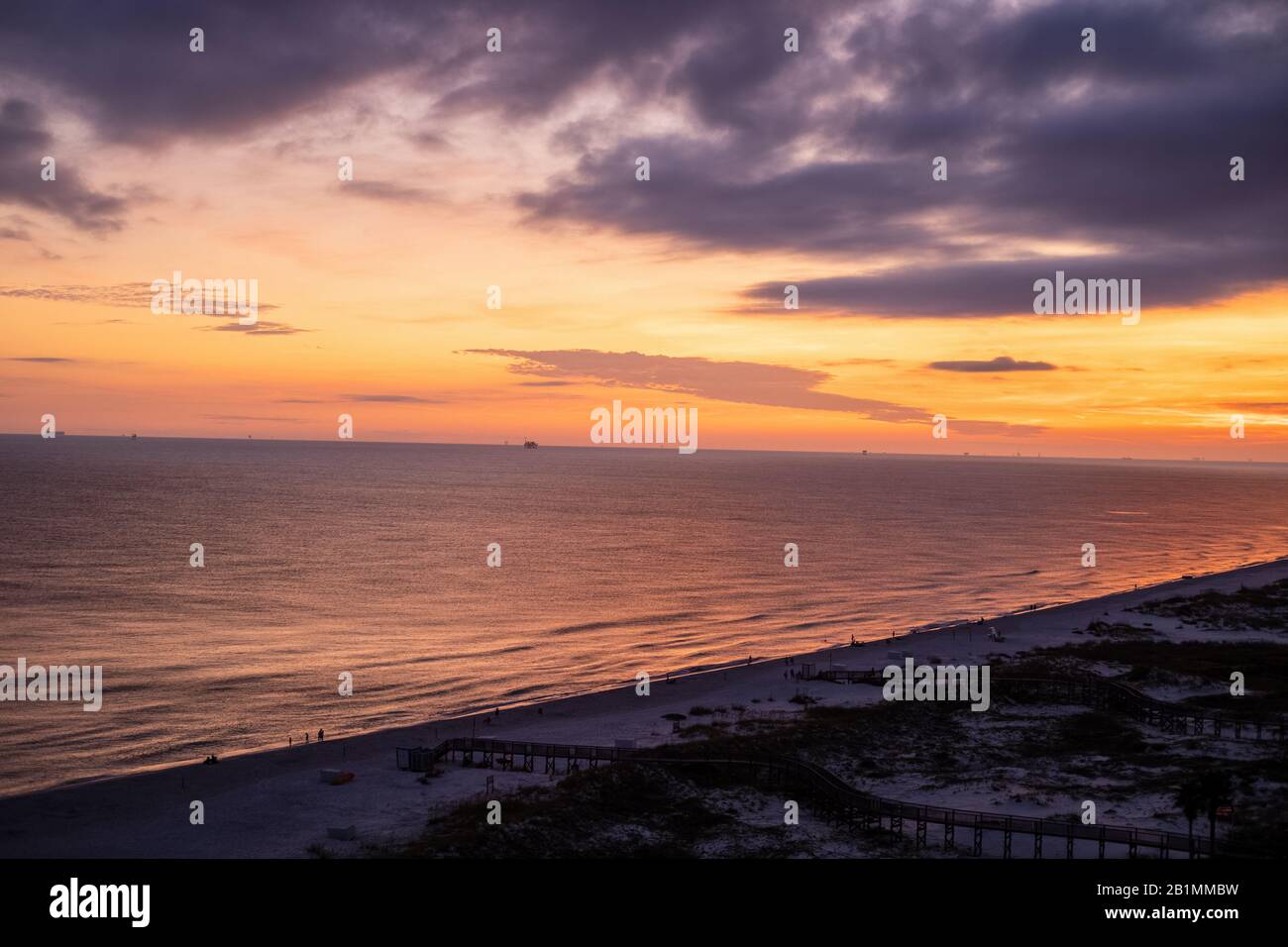 A beautiful sunset out in the gulf Stock Photo - Alamy