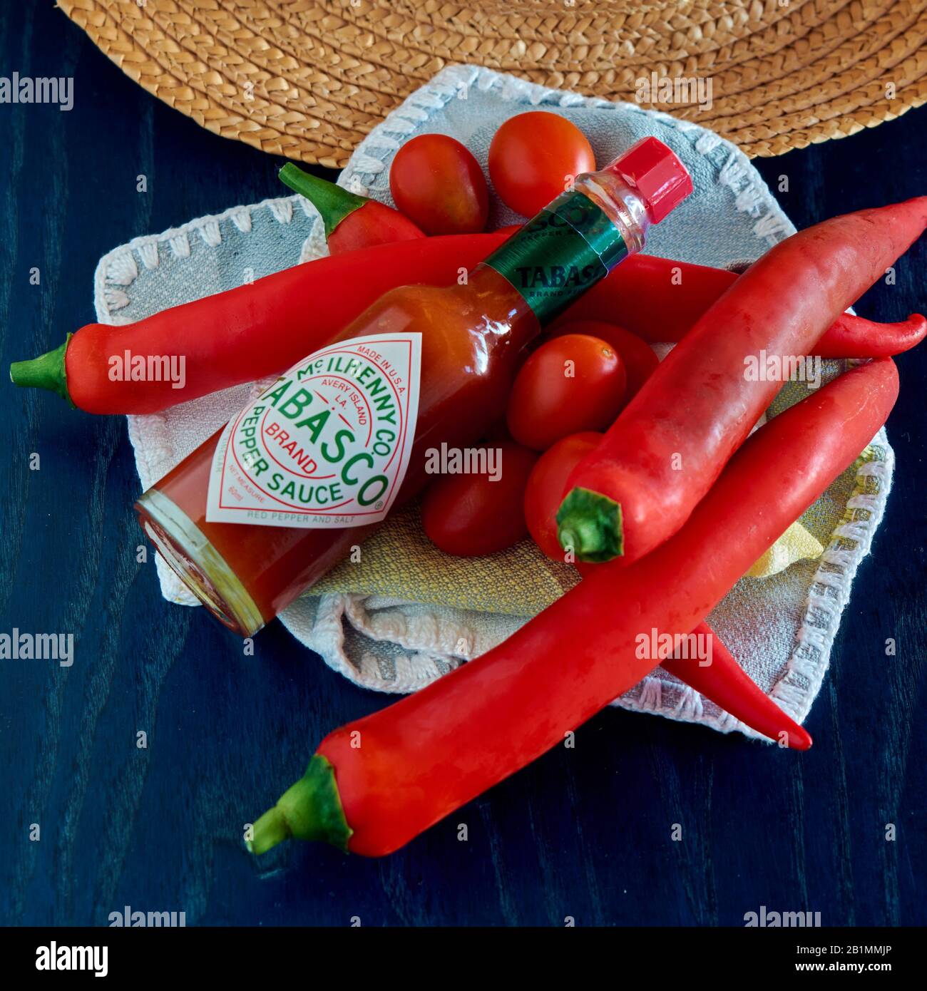 bottle of Tabasco sauce, spicy chilis, bright colors, red, blue Stock ...
