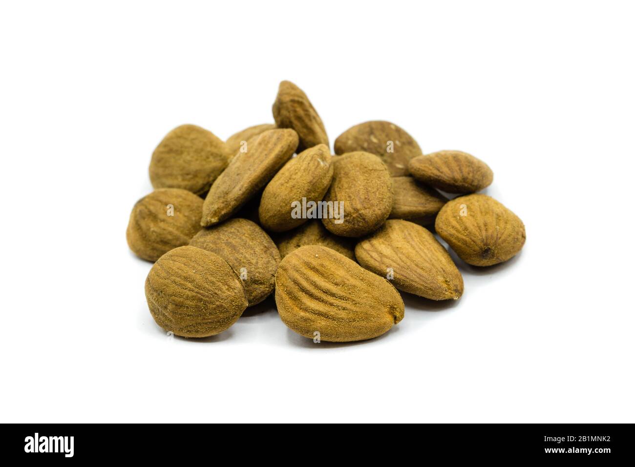 Almond kernels isolated on white background Stock Photo - Alamy