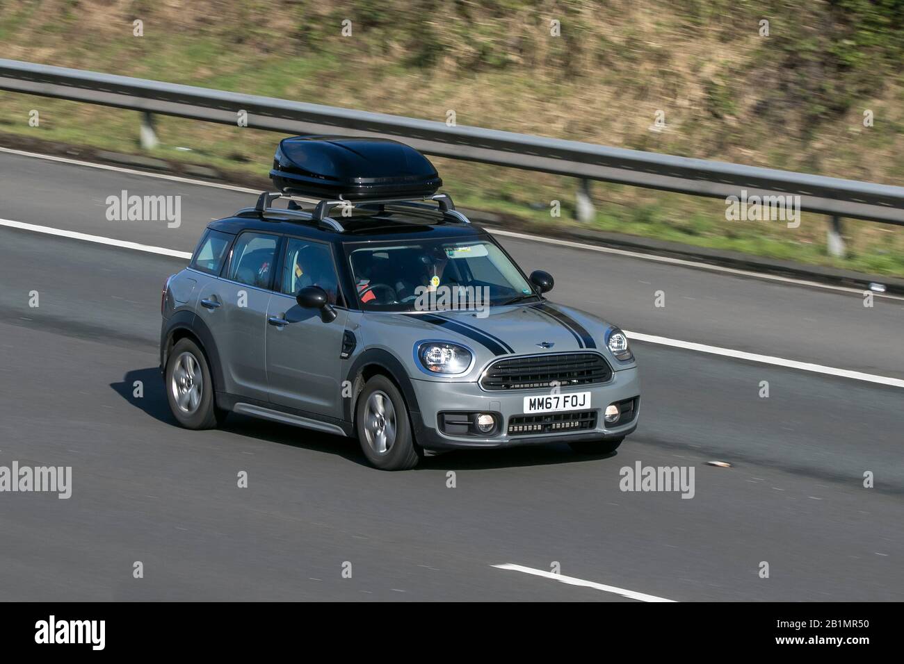 2017 Mini Countryman Cooper Grey Petrol car driving on the M6 motorway ...