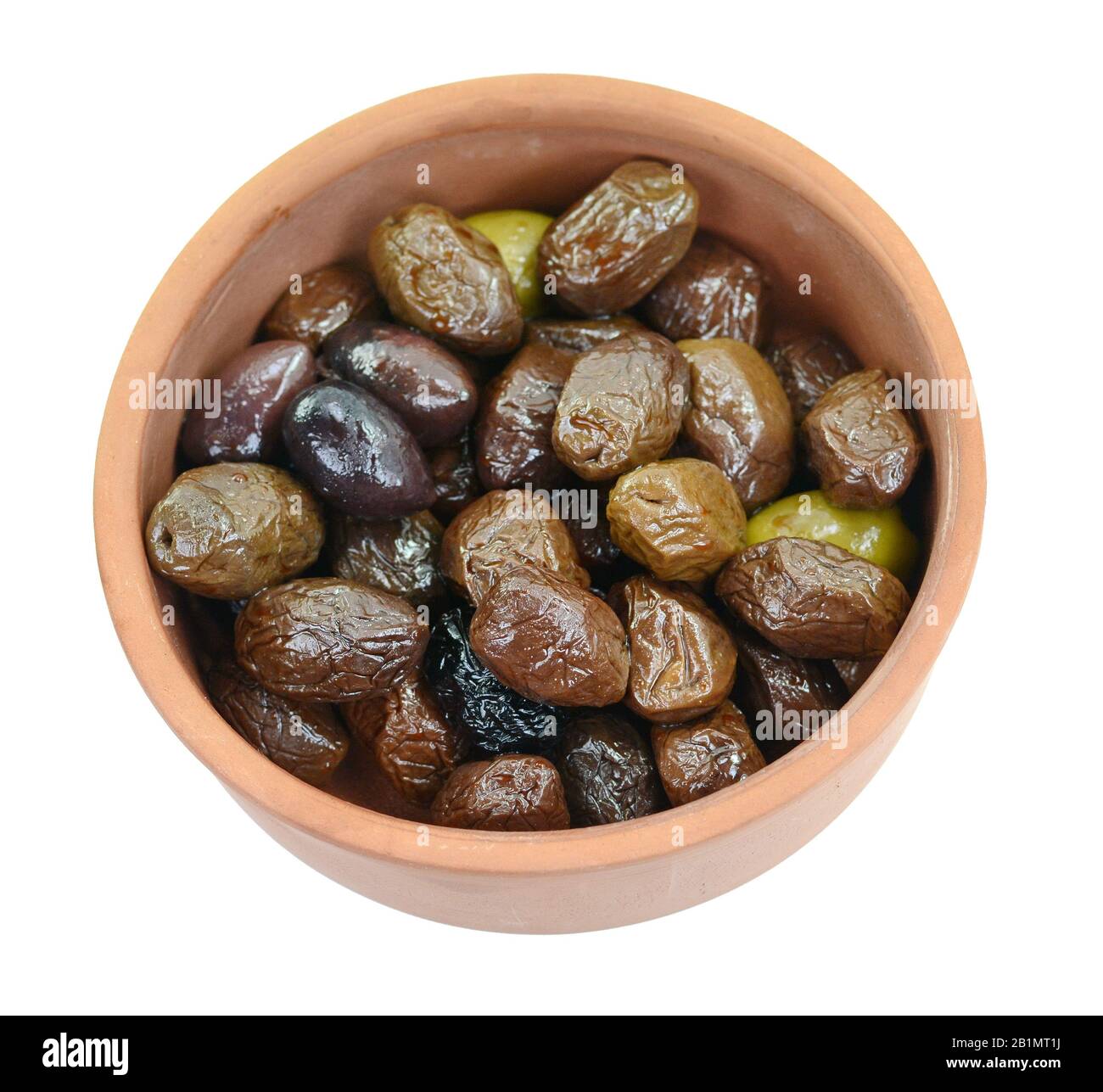 Olives in a clay bowl, isolated on white background Stock Photo - Alamy