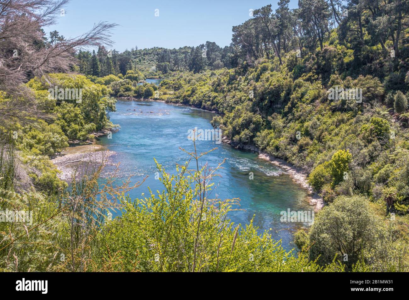 Calm and idyllic part of Waikato River near Huka Falls, New Zealand ...