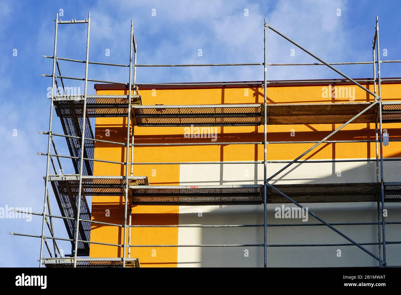 house facade renovation and thermal insulation, scaffolding Stock Photo ...