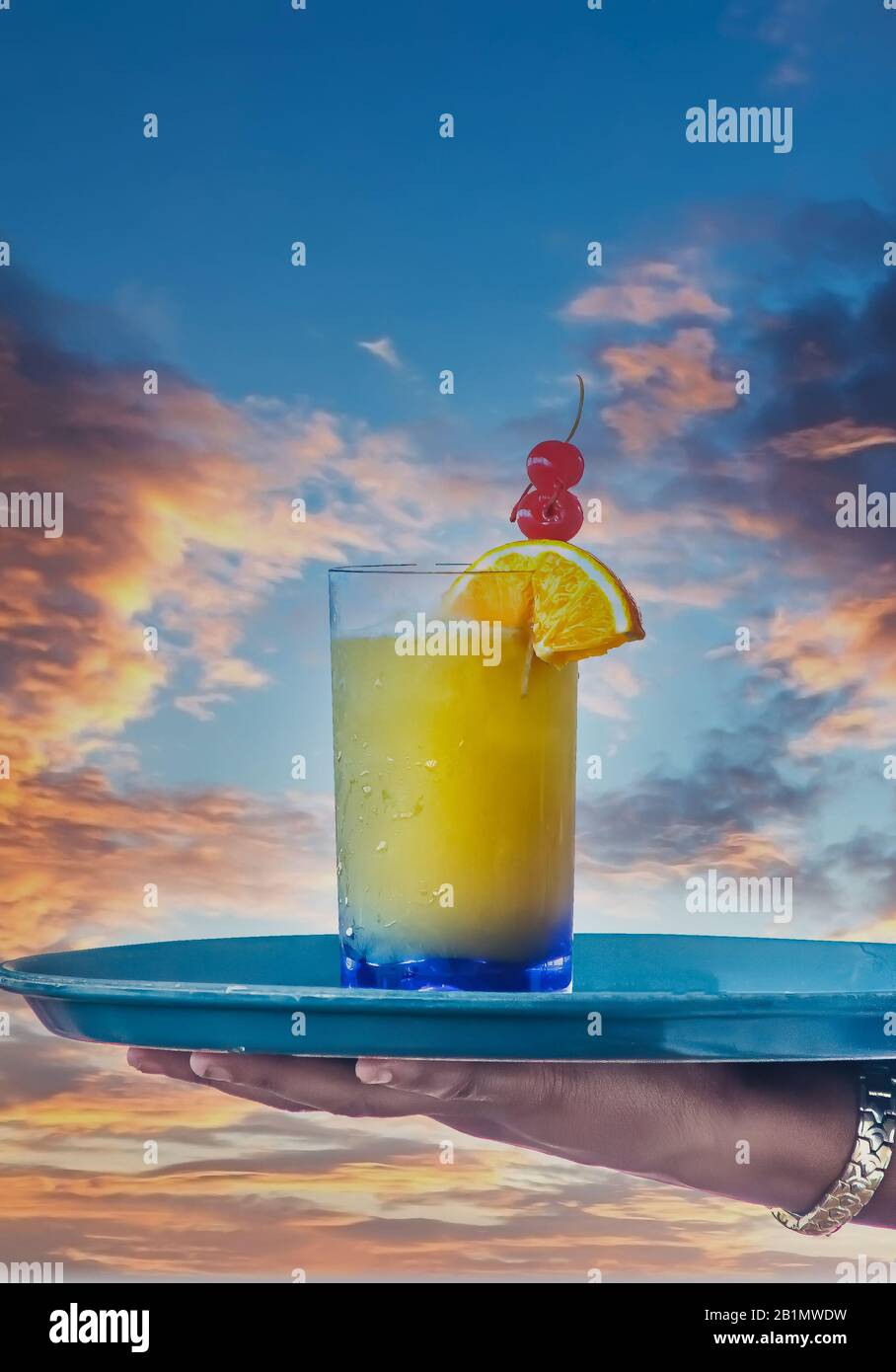 Tropical Drink Over Sunset Stock Photo - Alamy