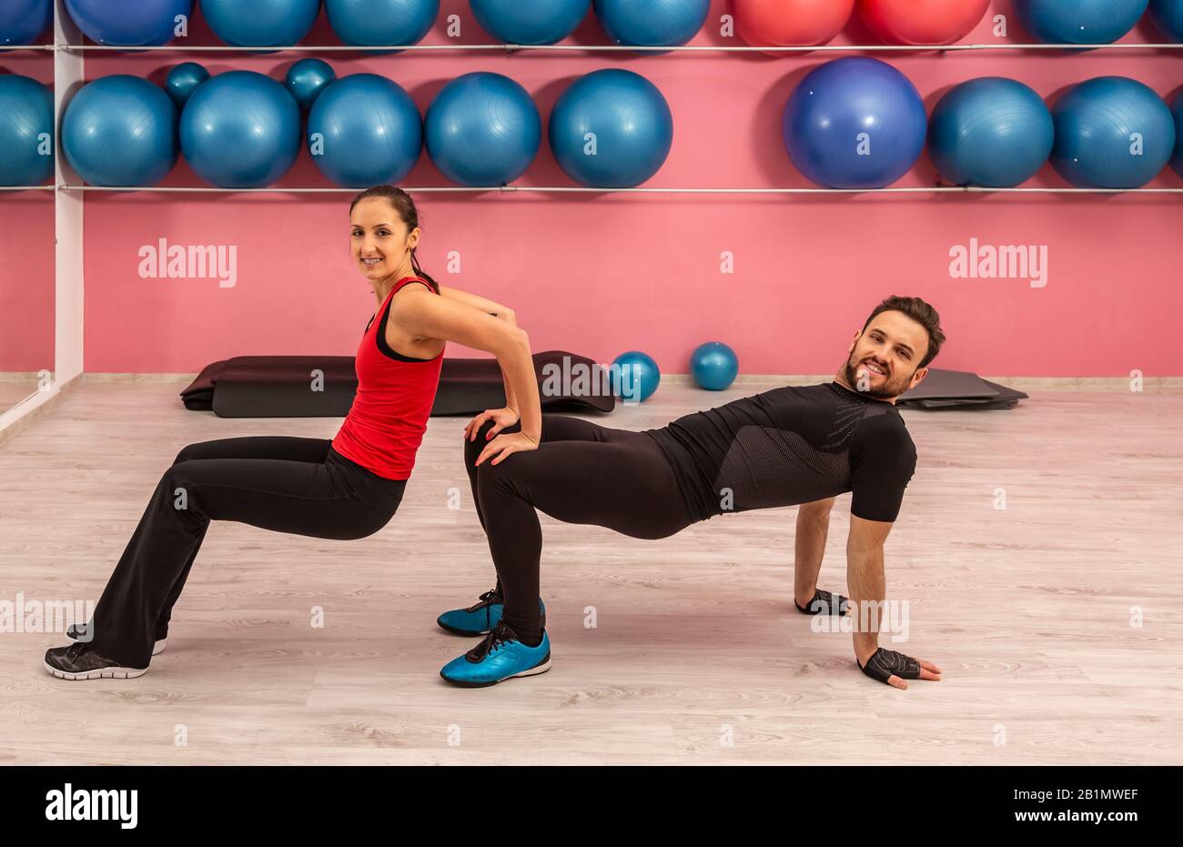 Portrait couple doing physical exercise hi-res stock photography and ...