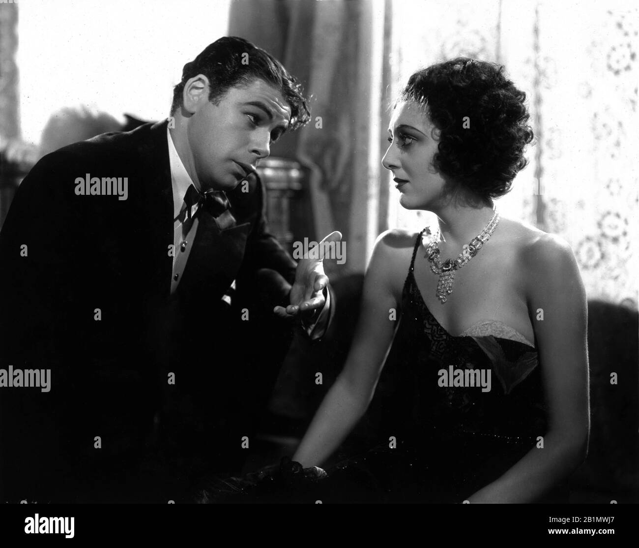 PAUL MUNI as Tony Camonte and ANN DVORAK in SCARFACE 1932 directors ...