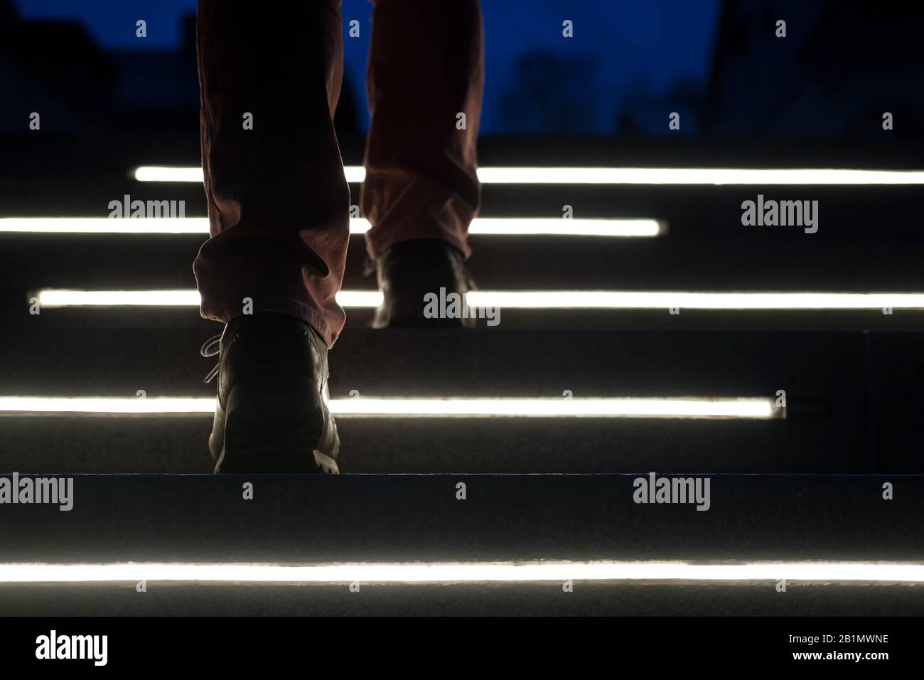 Feet at bottom of steps hi-res stock photography and images - Alamy