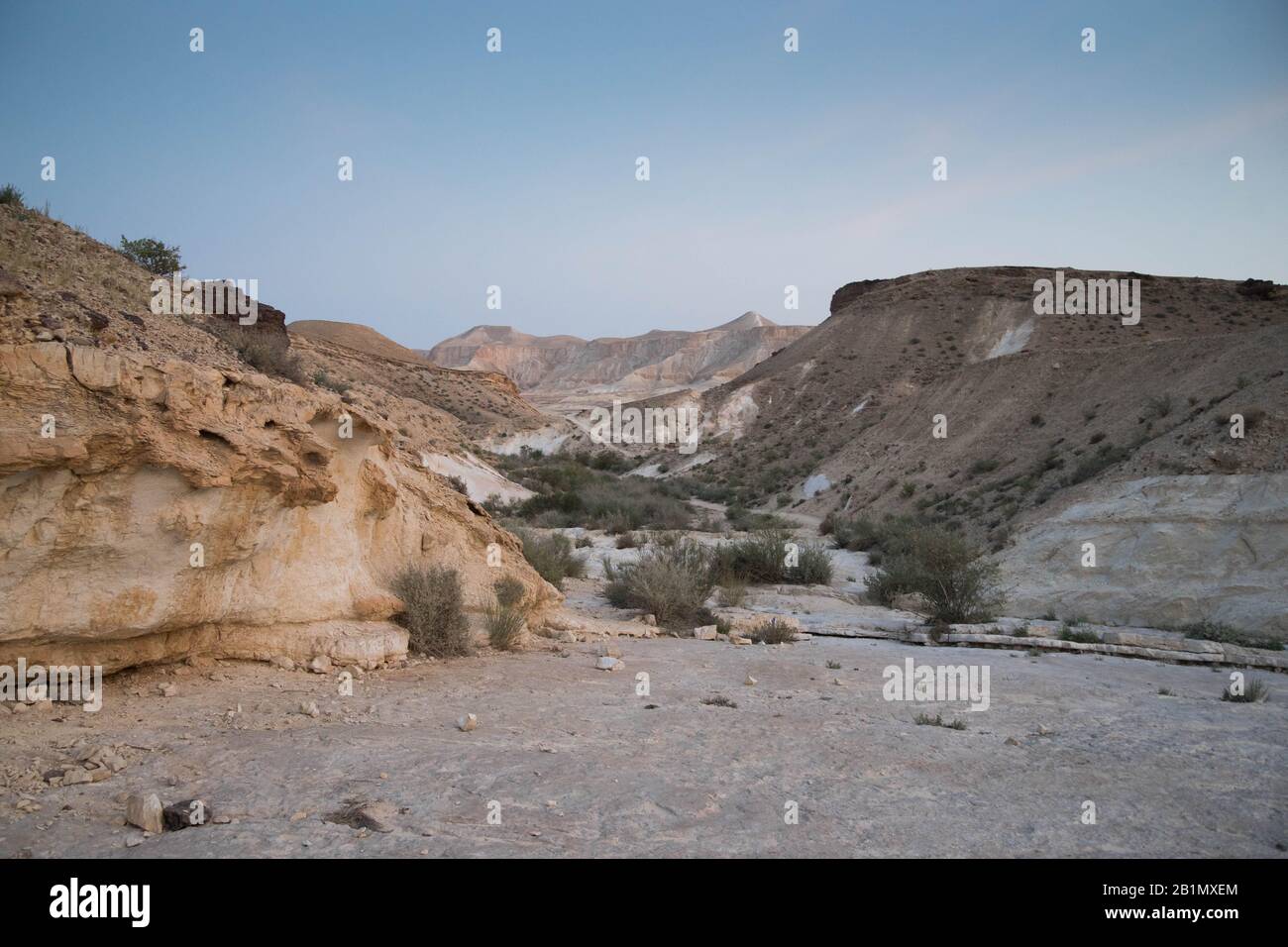 Hiking in stone desert mountain landscape of Israel Stock Photo - Alamy