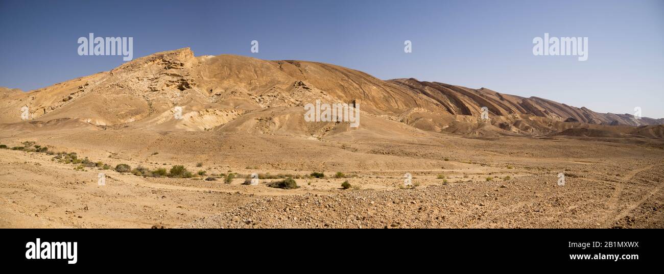 Hiking in stone desert mountain landscape of Israel Stock Photo - Alamy