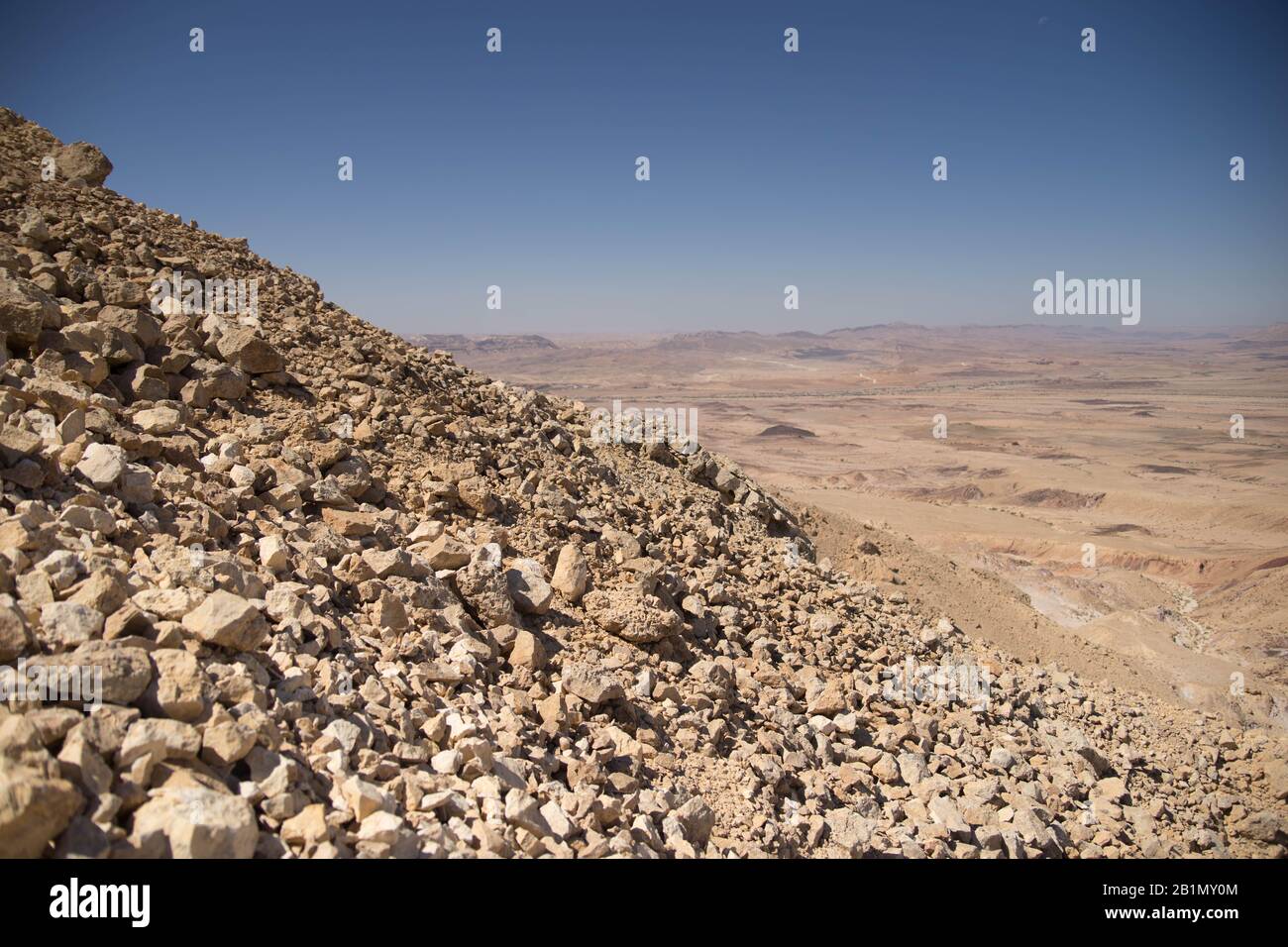 Hiking in stone desert mountain landscape of Israel Stock Photo - Alamy