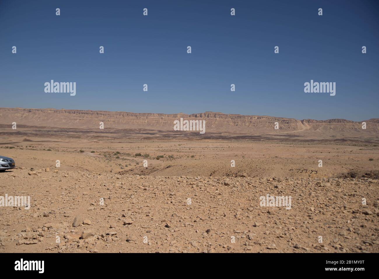 Hiking in stone desert mountain landscape of Israel Stock Photo - Alamy