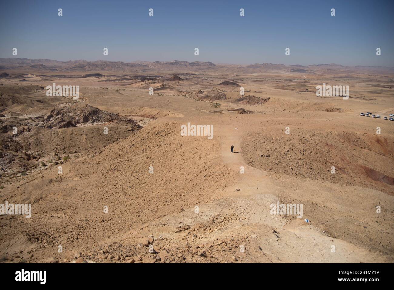 Hiking in stone desert mountain landscape of Israel Stock Photo - Alamy