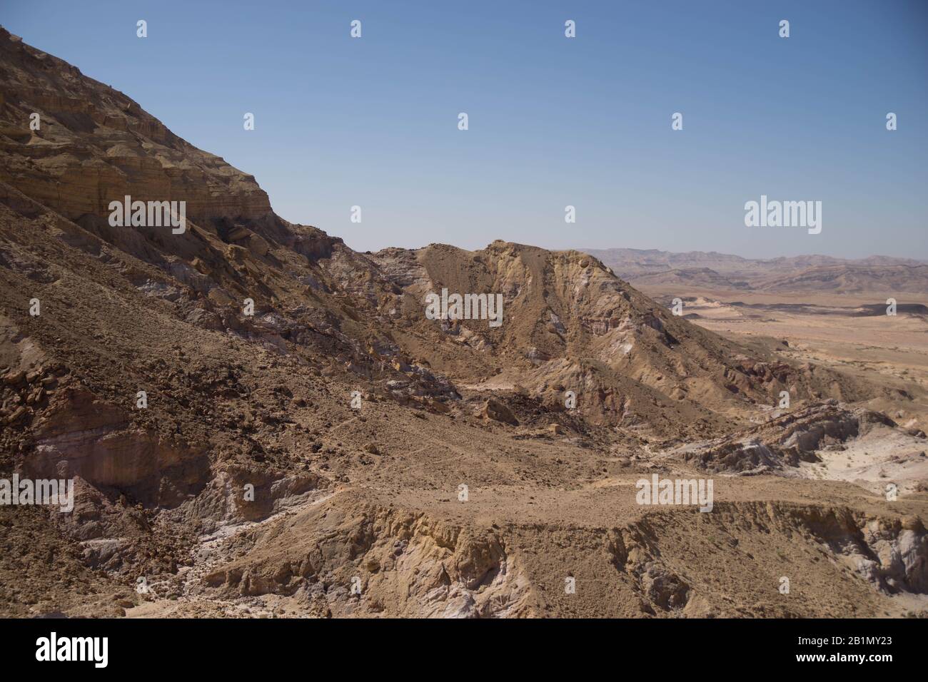 Hiking in stone desert mountain landscape of Israel Stock Photo - Alamy