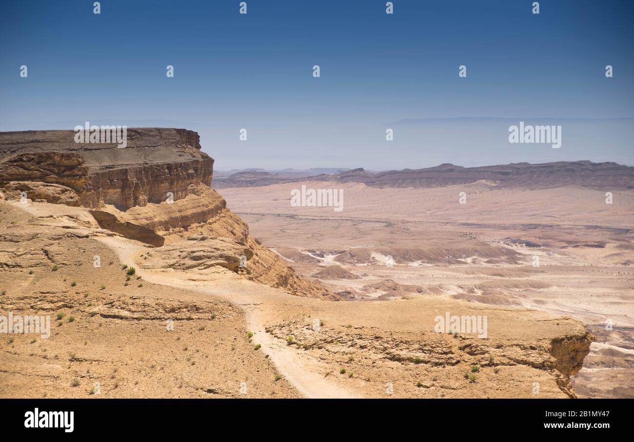 Hiking in stone desert mountain landscape of Israel Stock Photo - Alamy