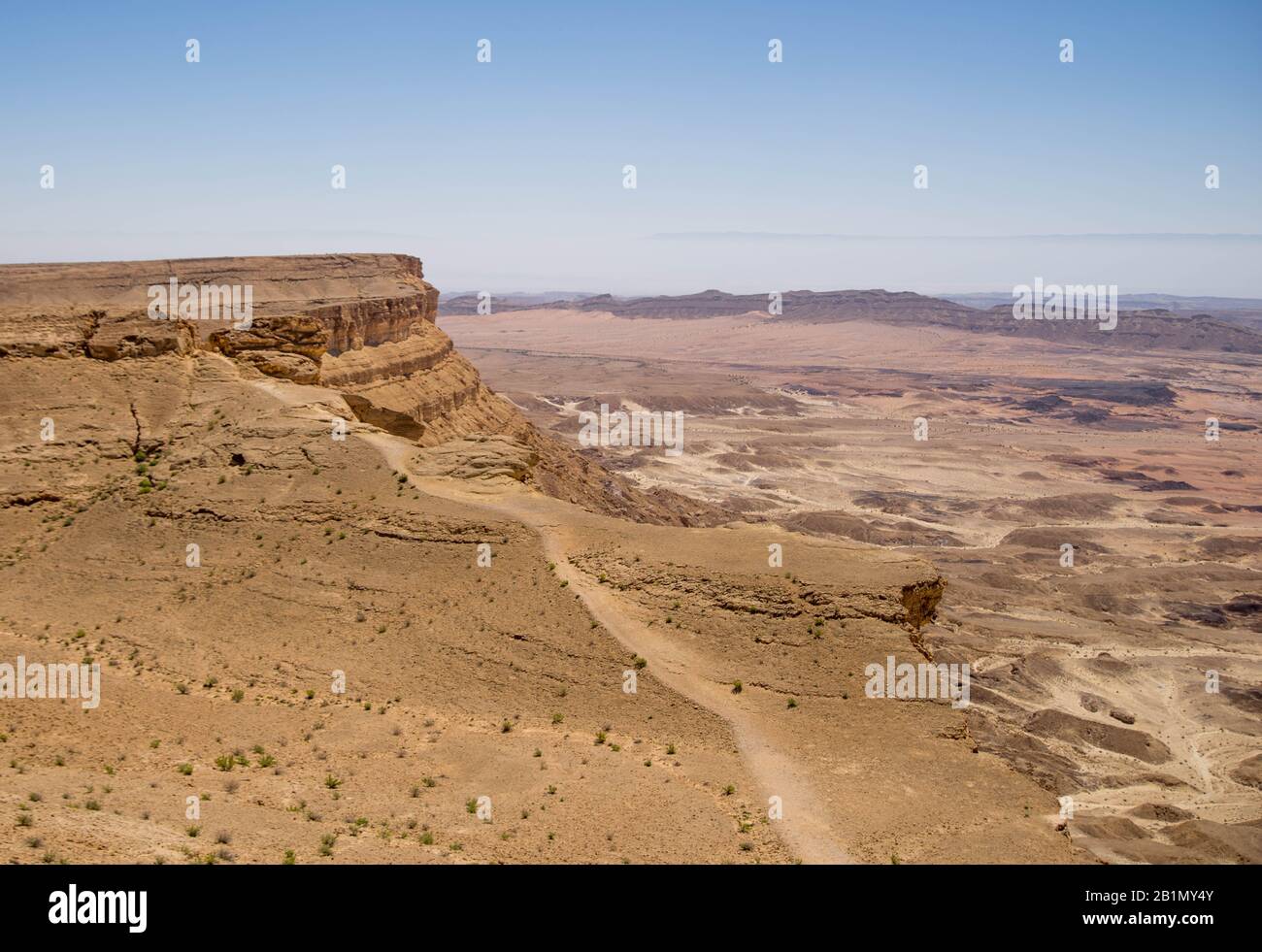 Hiking in stone desert mountain landscape of Israel Stock Photo - Alamy