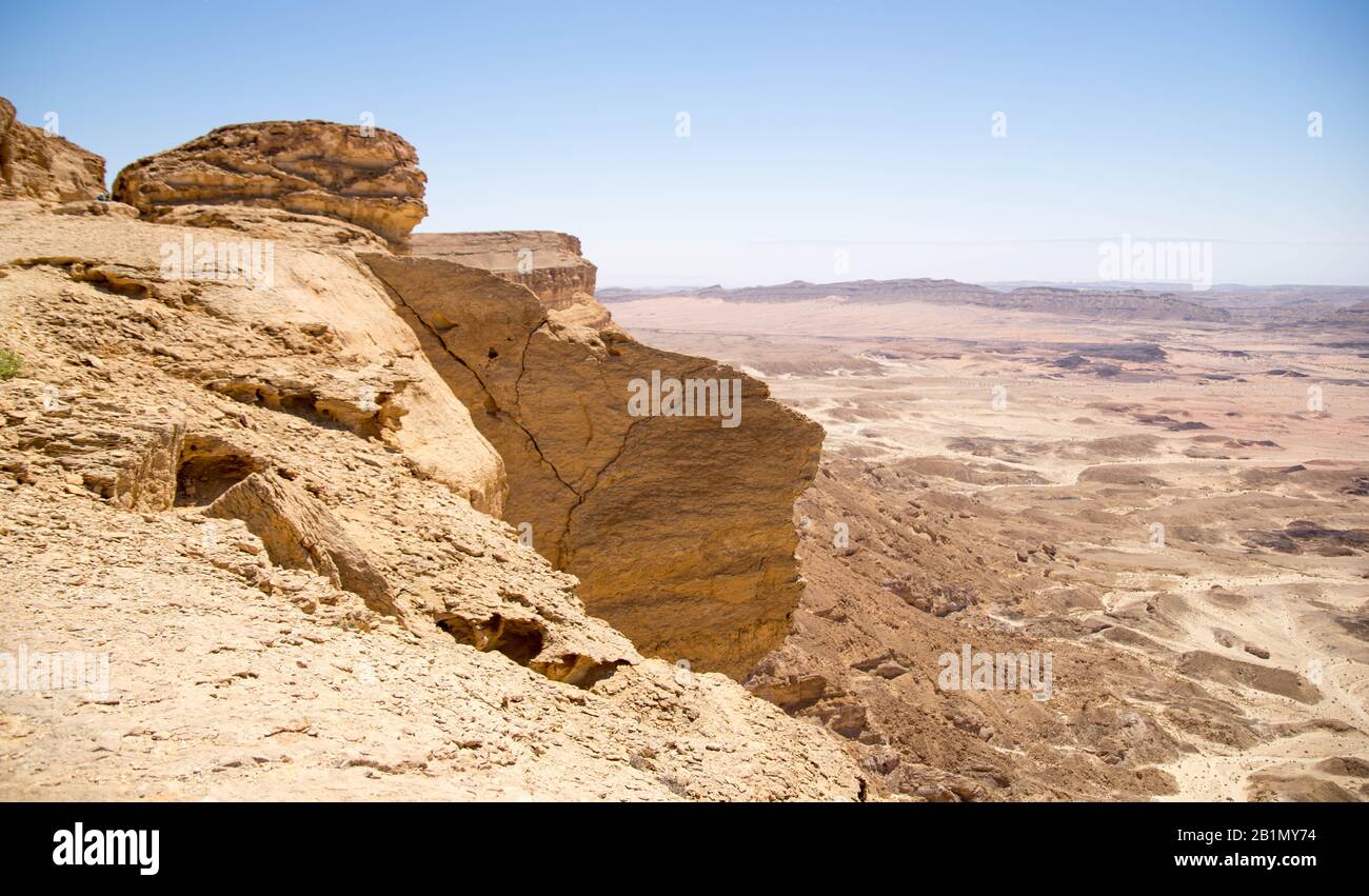 Hiking in stone desert mountain landscape of Israel Stock Photo - Alamy