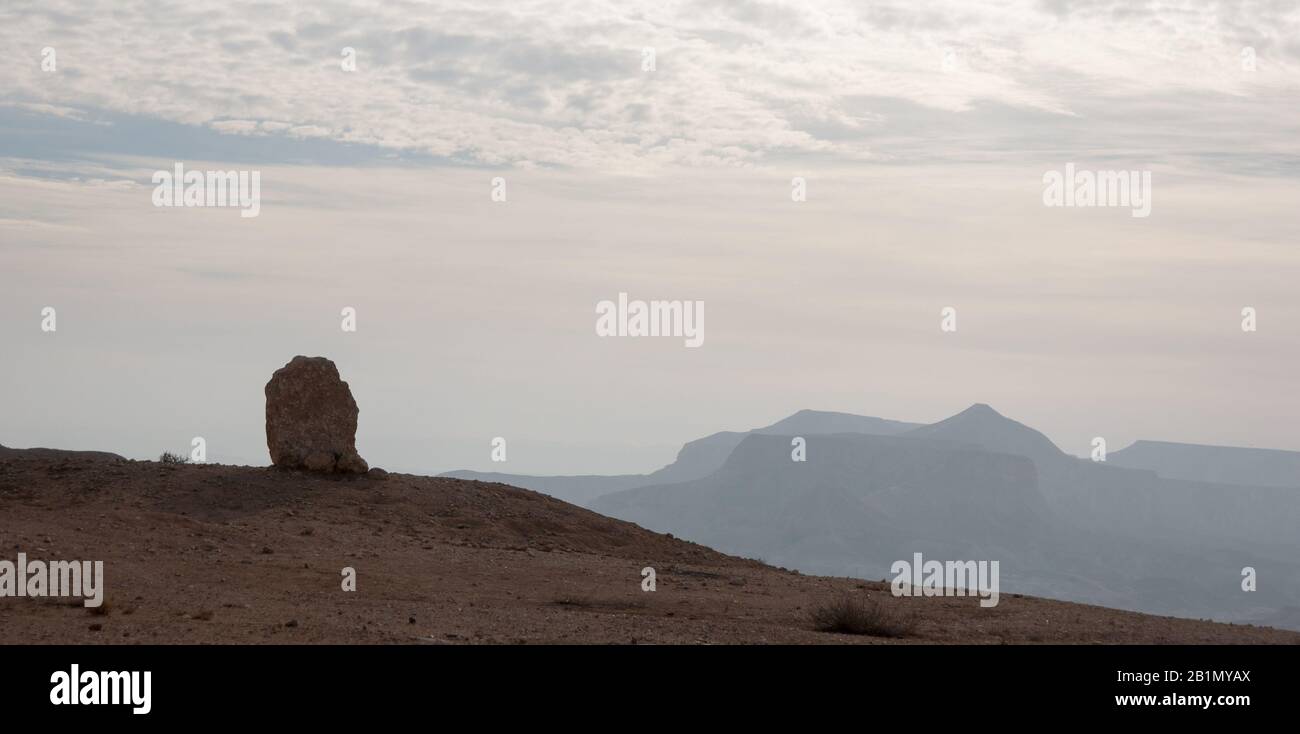 Stone desert tourism hiking in mountains under blue sky Stock Photo - Alamy
