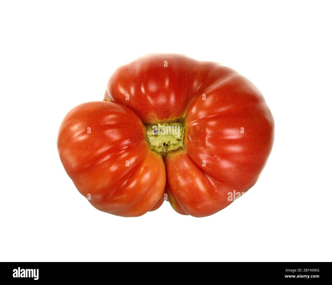 Strange shape fresh tomato isolated on white background Stock Photo - Alamy