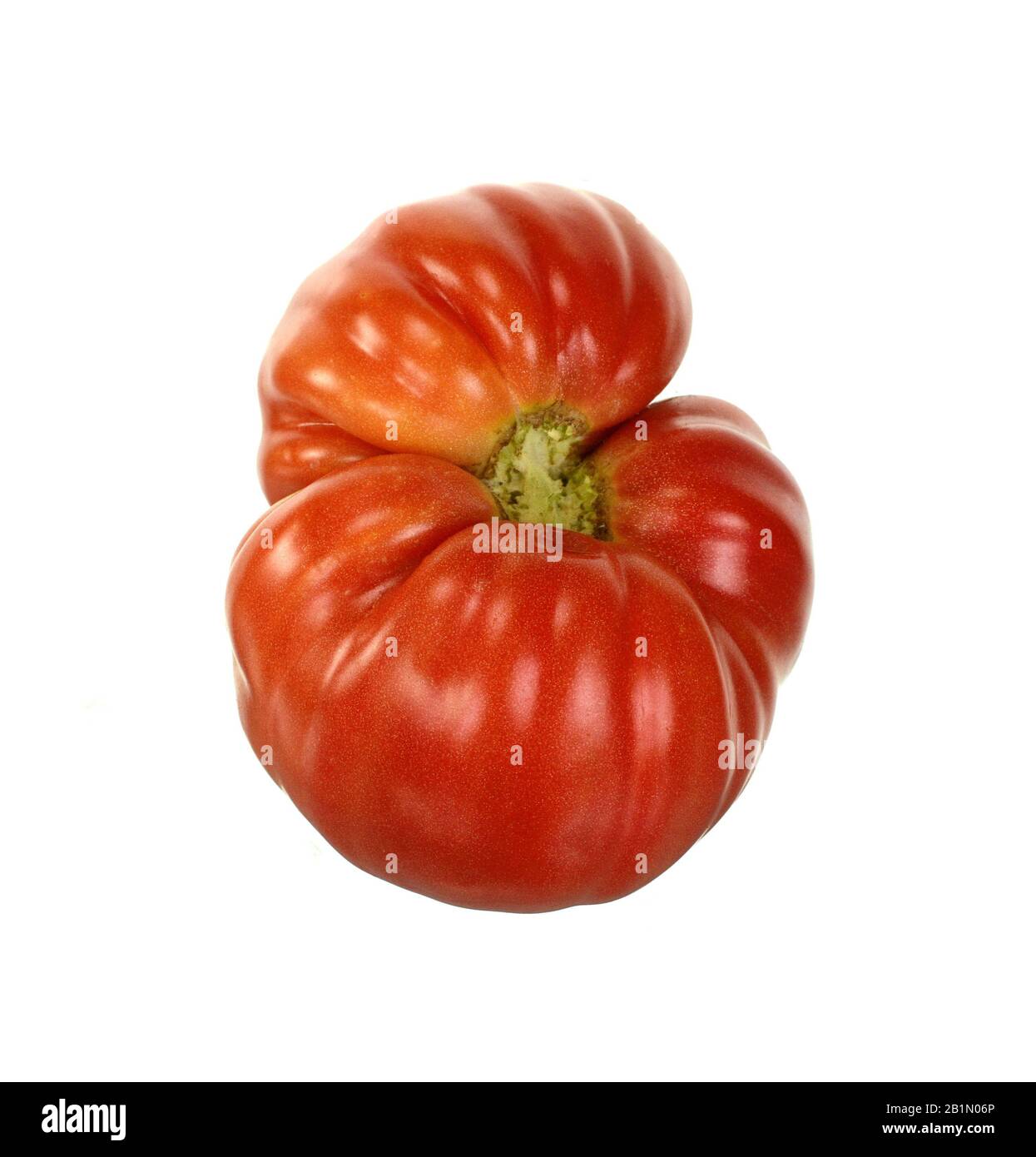 Strange shape fresh tomato isolated on white background Stock Photo - Alamy