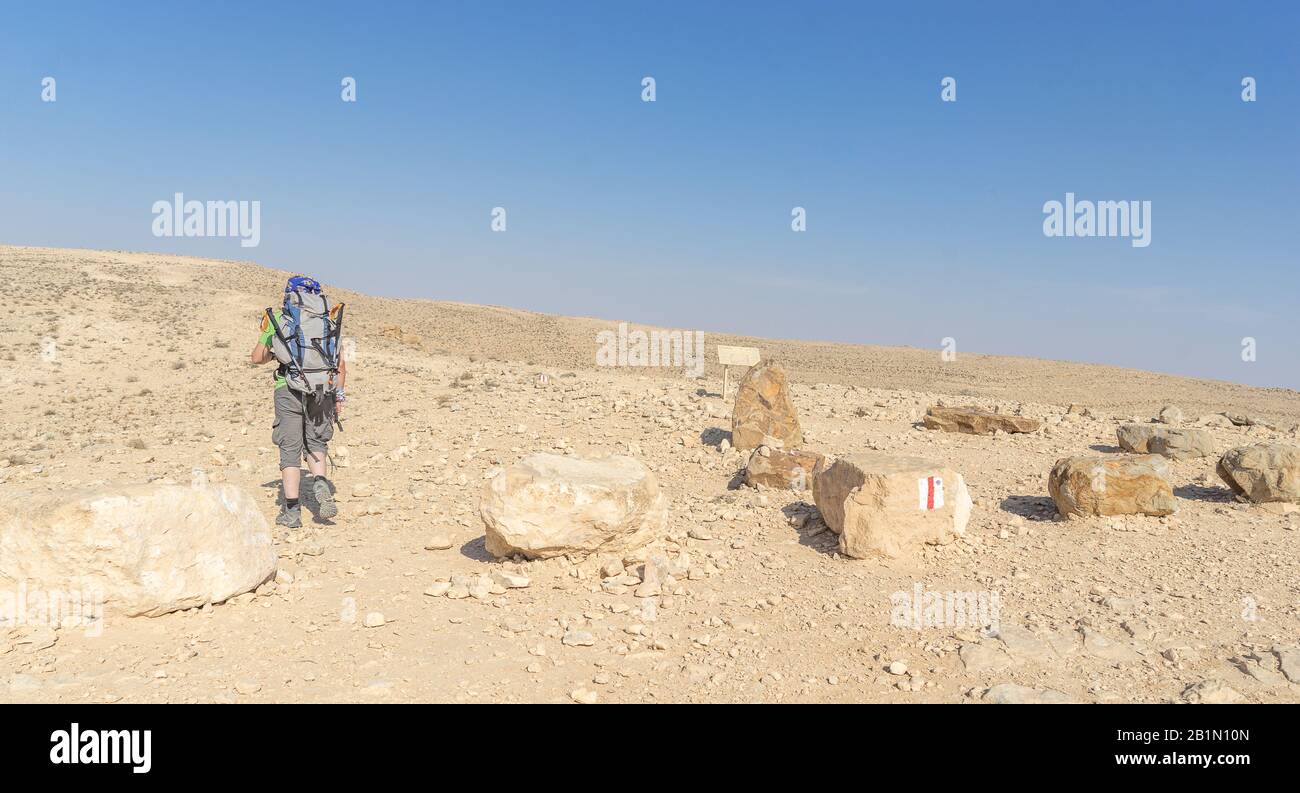 Hiking in israeli negev desert for health and fun Stock Photo - Alamy
