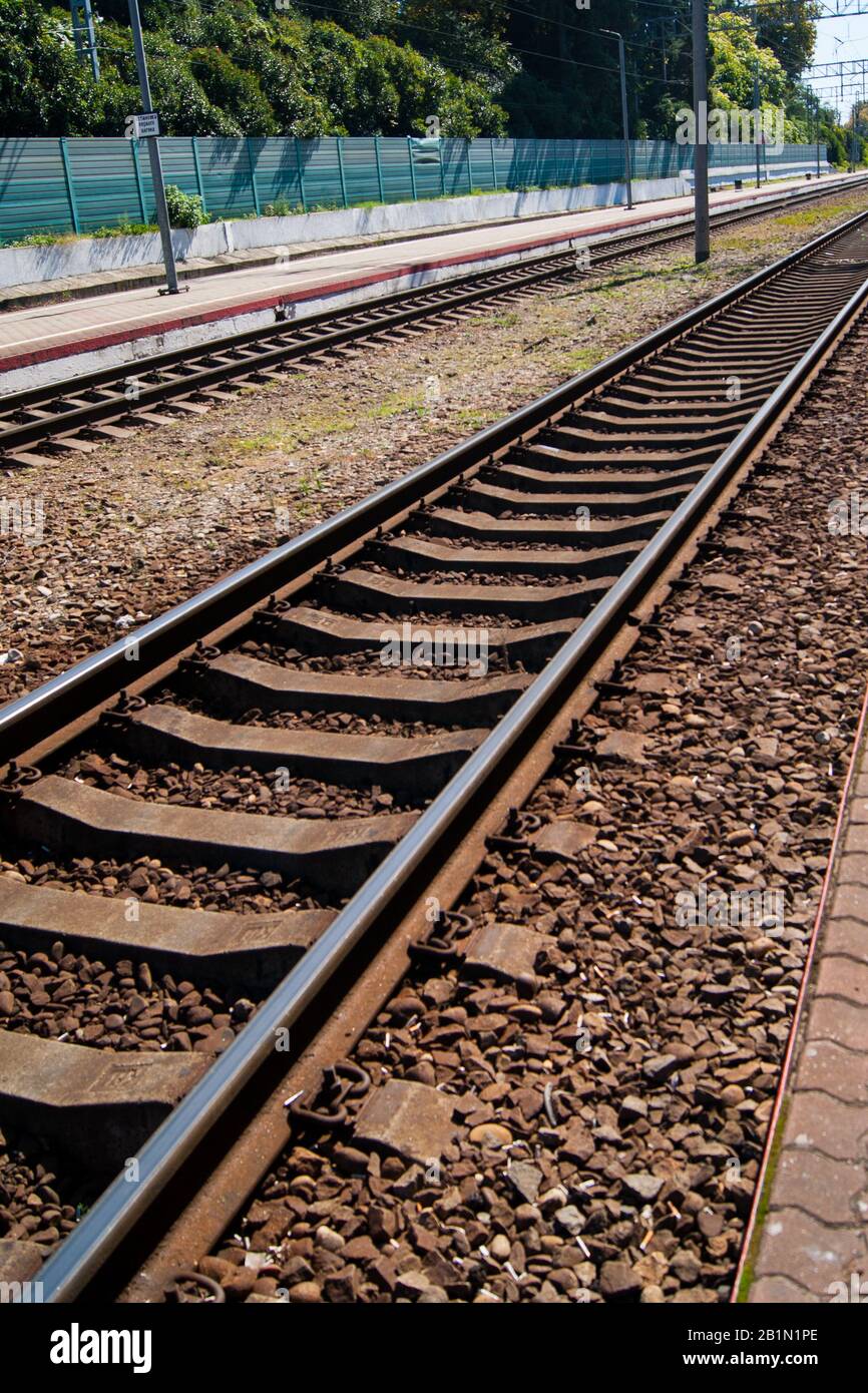 Rails, sleepers, railway close-up - vertical photo. Railroads Stock Photo - Alamy
