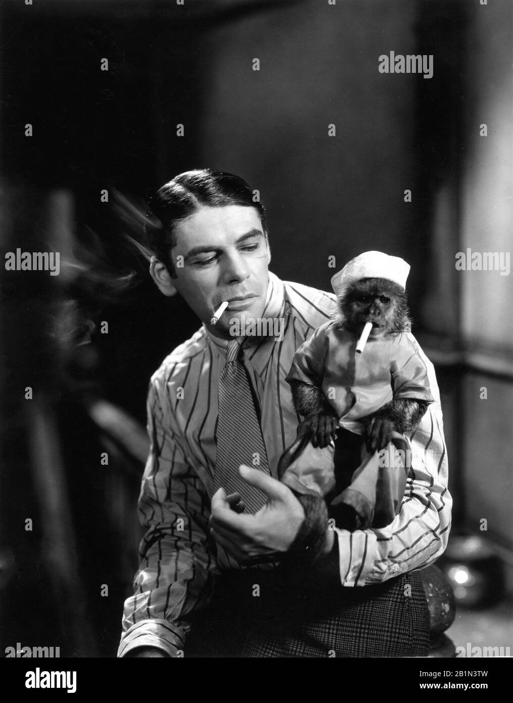 PAUL MUNI as Tony Camonte on set candid with JOCKO the Monkey both ...