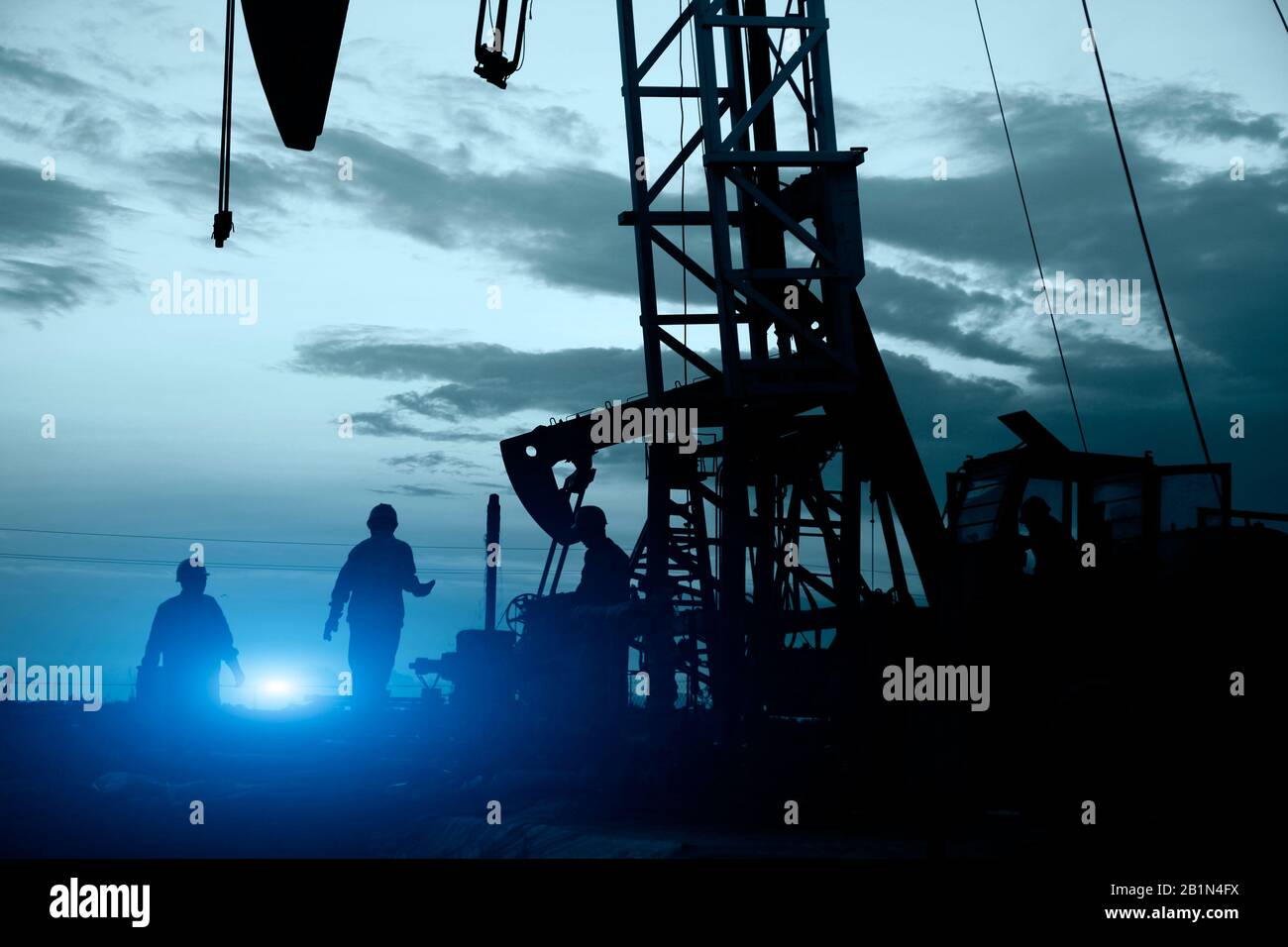 oil field, the oil workers are working Stock Photo - Alamy