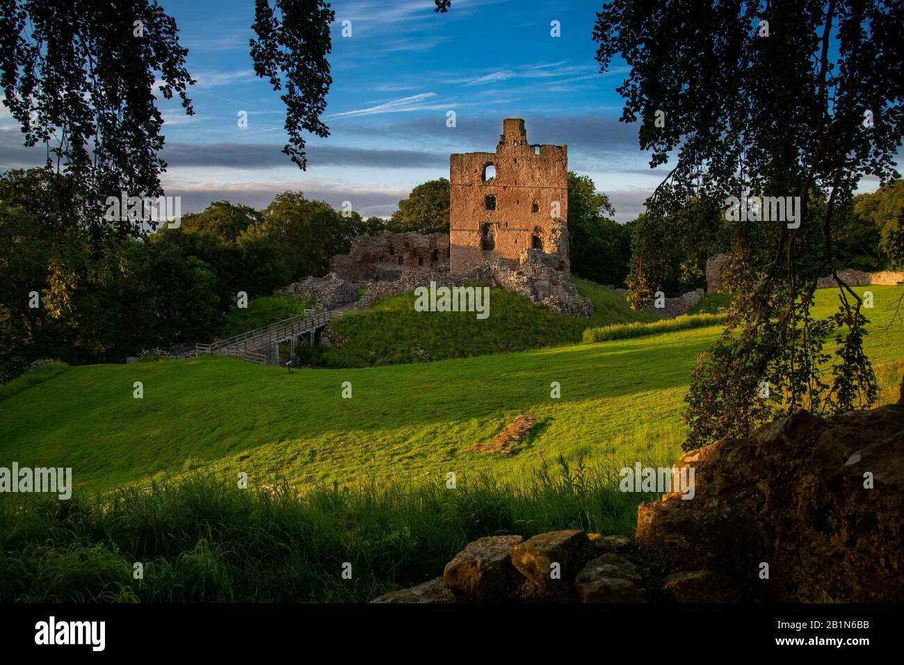 The ruined remains of Norham Castle guarding one of the strategic fords ...