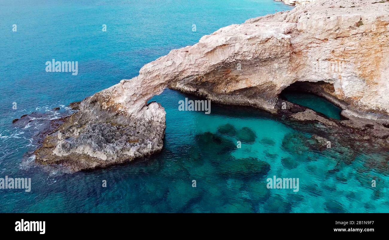 stone bridge for lovers Love Bridges on the seashore near mountains on ...