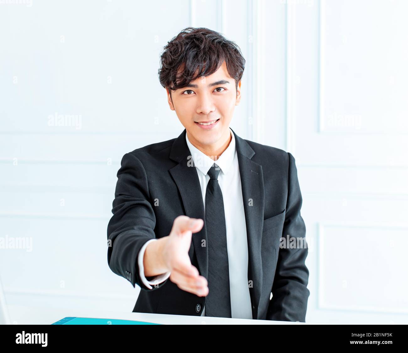 Asian handshake partnership hi-res stock photography and images - Alamy
