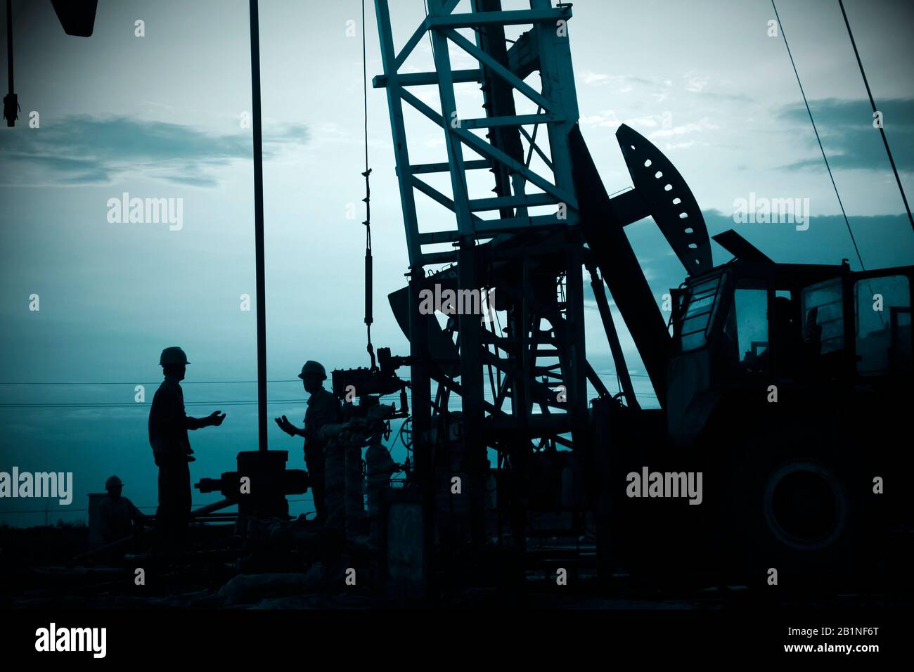 oil field, the oil workers are working Stock Photo - Alamy