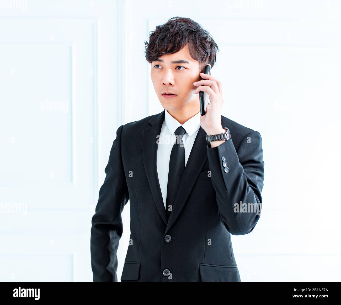 Young business man making call hi-res stock photography and images - Alamy