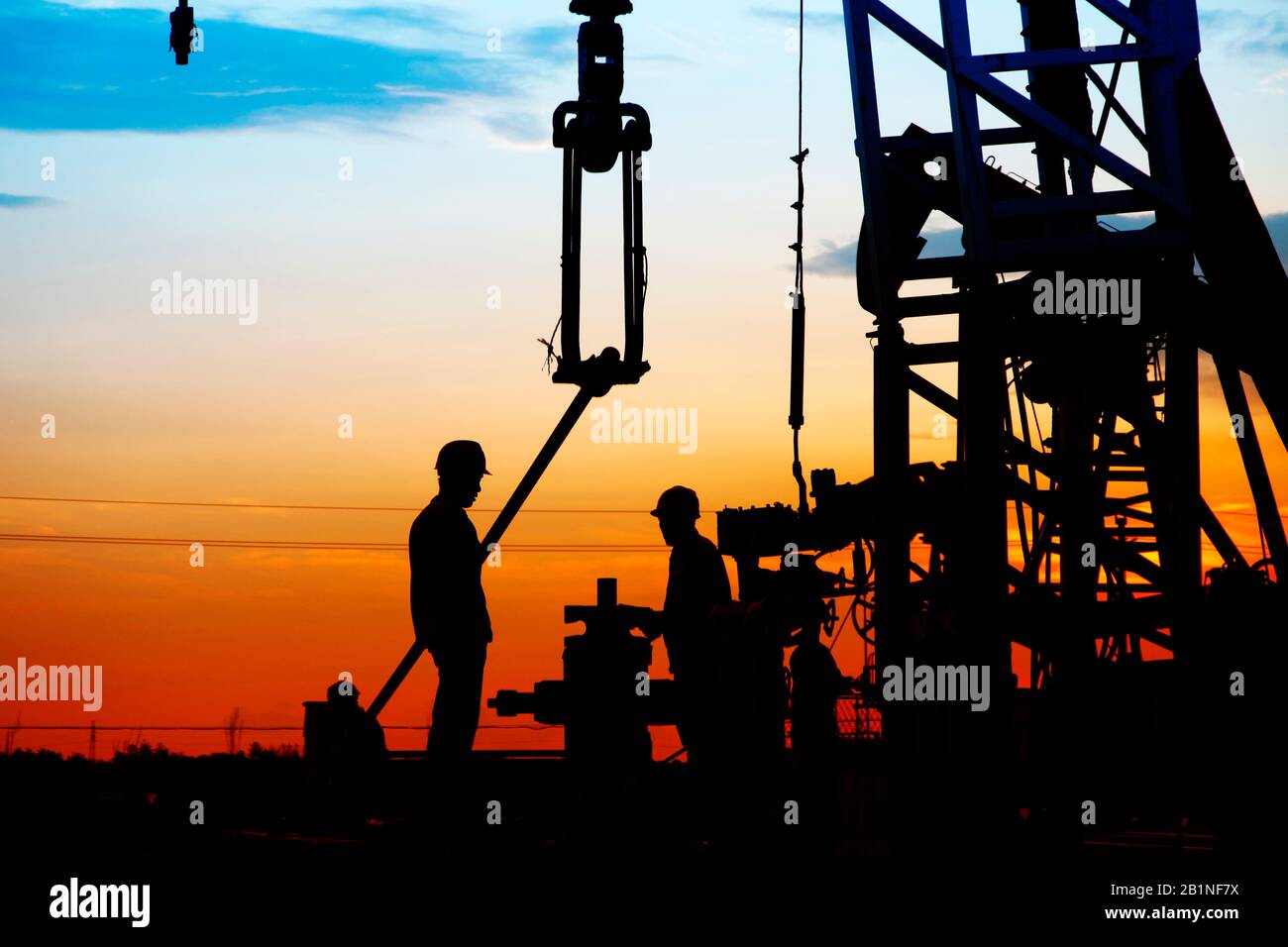 oil field, the oil workers are working Stock Photo - Alamy